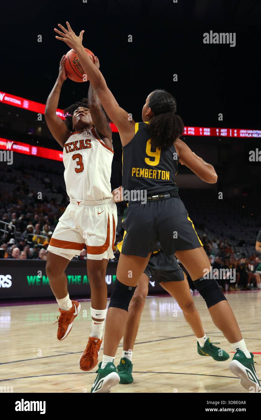 Texas guard Rori Harmon (3) shoots against Baylor forward Kiera ...