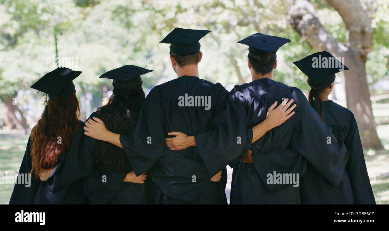 Hug, graduation and back of students in park for education, achievement ...