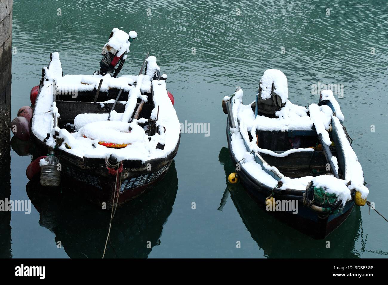 Aerial photo shows the snow scenery at the Tangdao Bay in Qingdao City ...