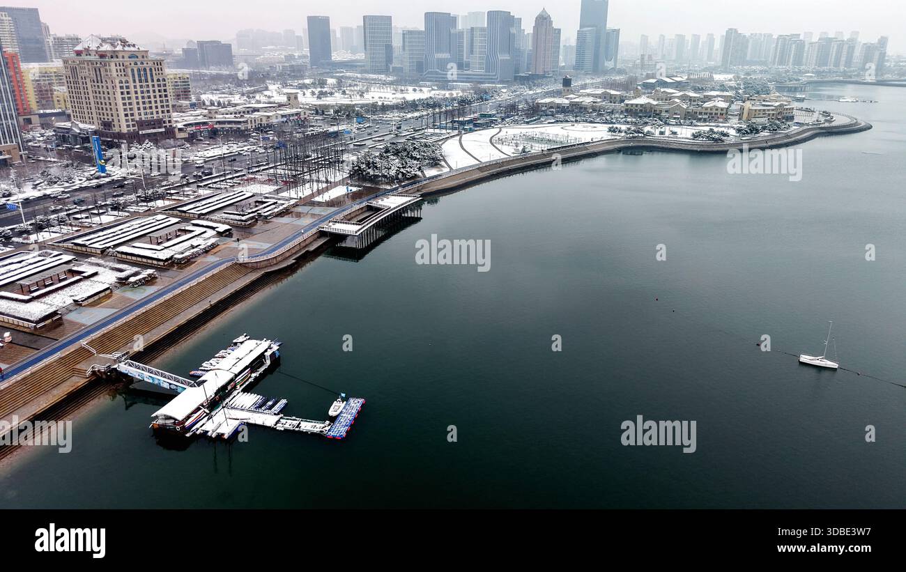 Aerial photo shows the snow scenery at the Tangdao Bay in Qingdao City ...