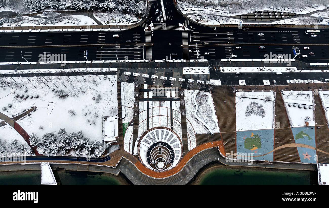 Aerial photo shows the snow scenery at the Tangdao Bay in Qingdao City ...