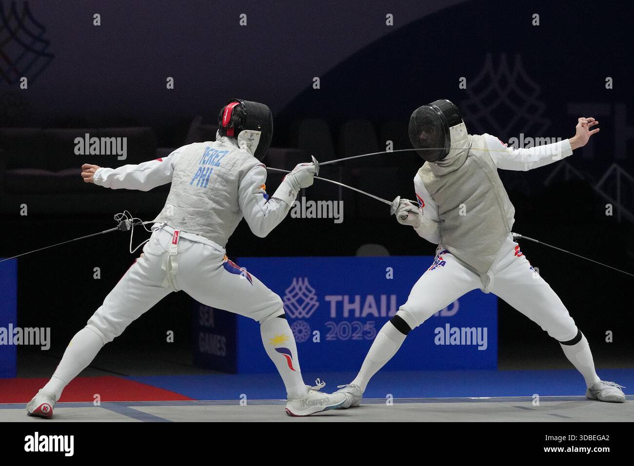 Philipina's Nathaniel Perez, left, competes against Thailand's ...