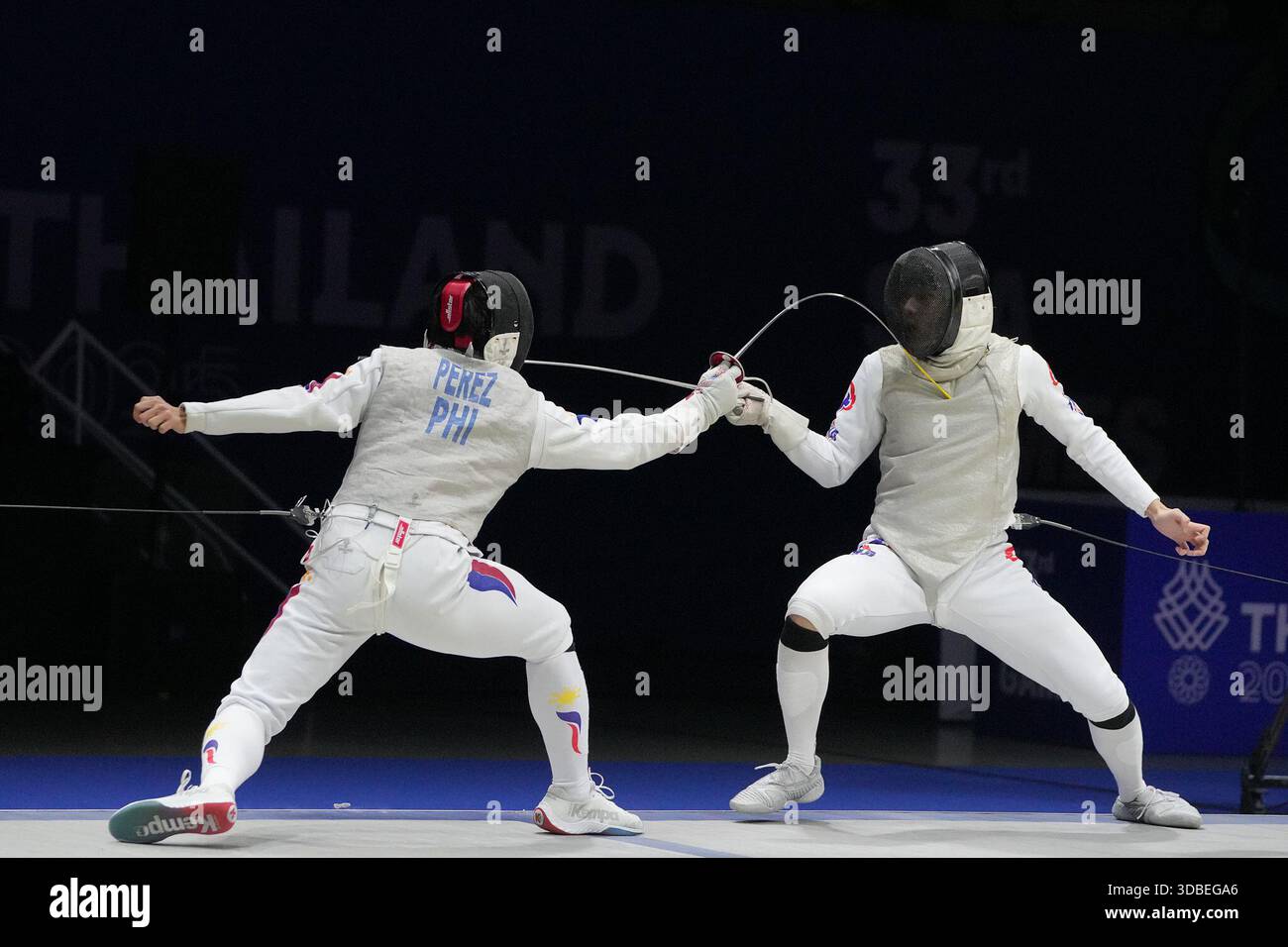 Philipina's Nathaniel Perez, left, competes against Thailand's ...