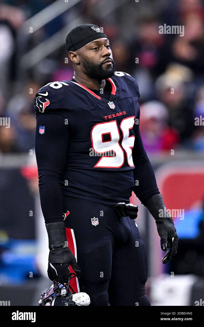 Houston Texans defensive end Denico Autry (96) looks on during a ...