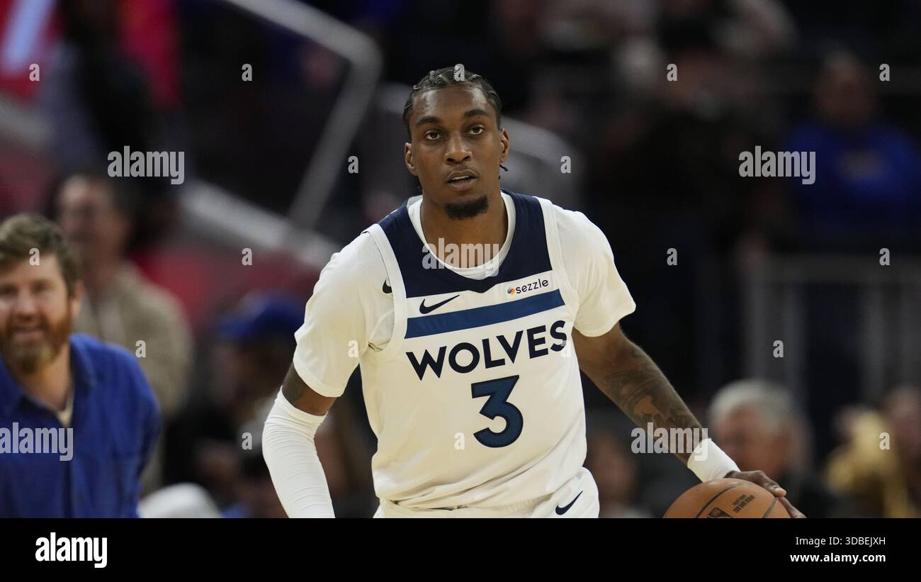 Minnesota Timberwolves forward Jaden McDaniels (3) moves the ball ...