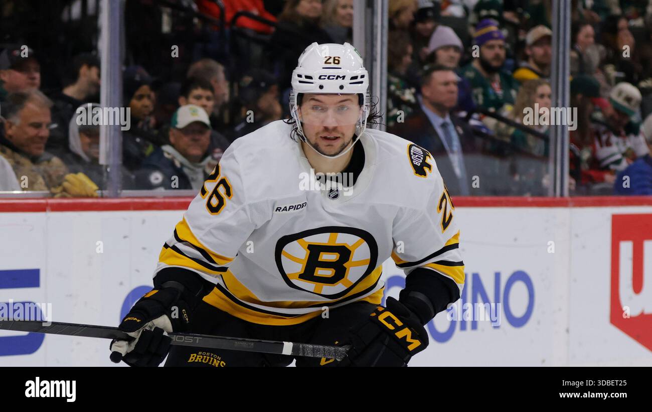Boston Bruins defenseman Andrew Peeke (26) skates on the ice during the ...