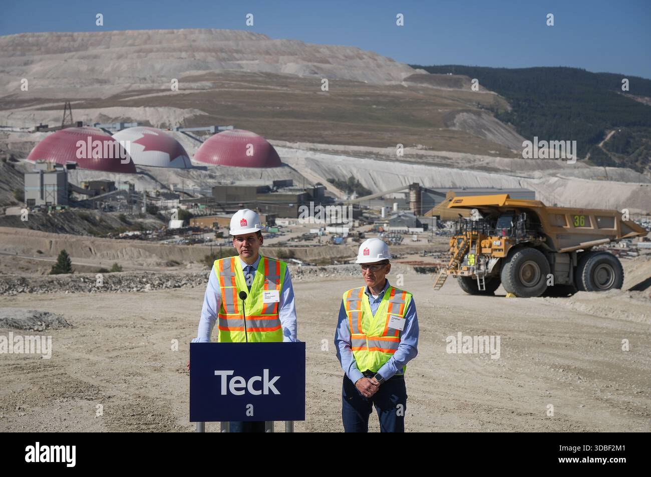 B.C. Premier David Eby, left, speaks as Teck Resources President and CEO Jonathan Price listens ...
