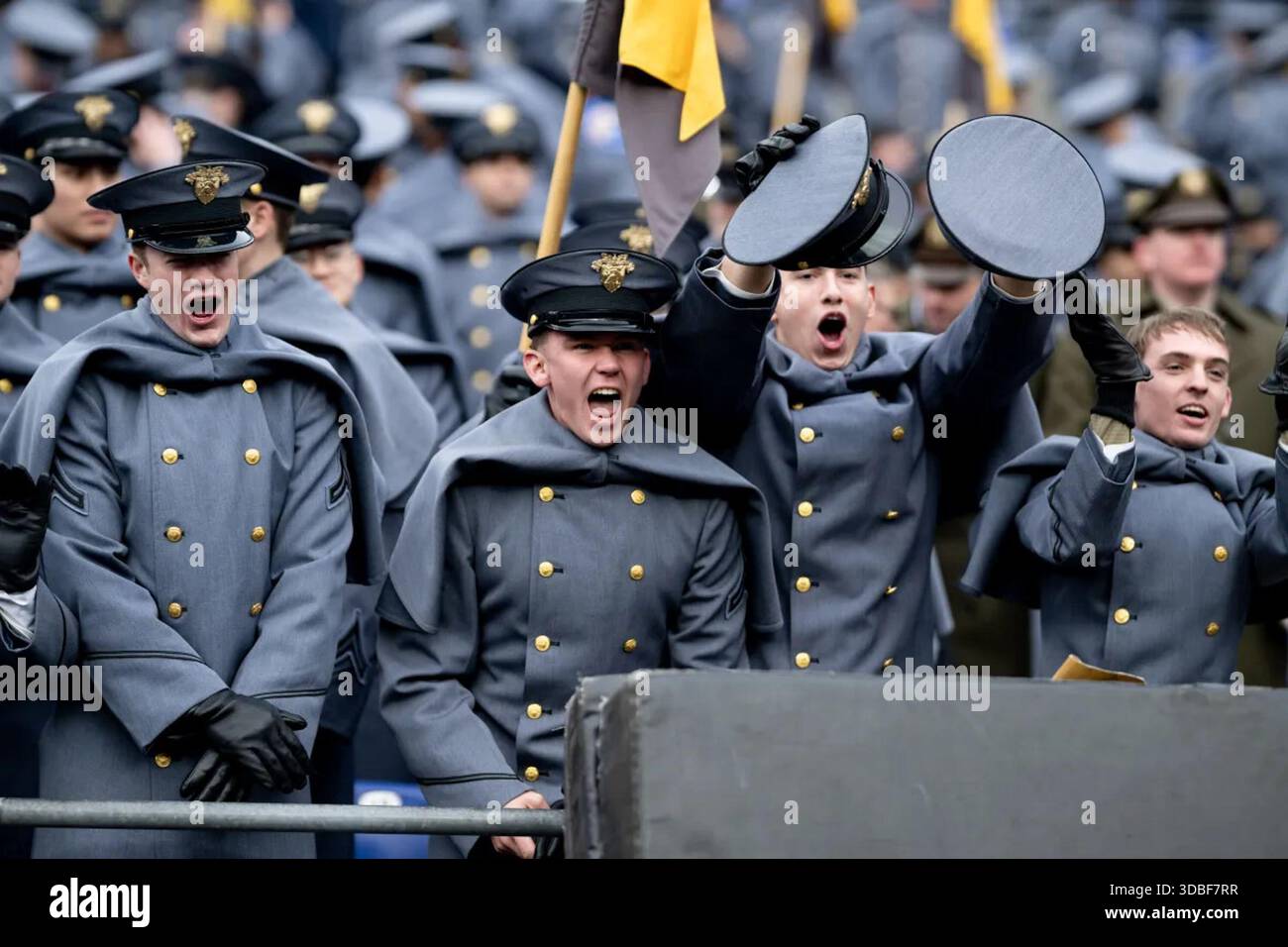 U.S. Military Academy cadets cheer and celebrate in the stands during ...