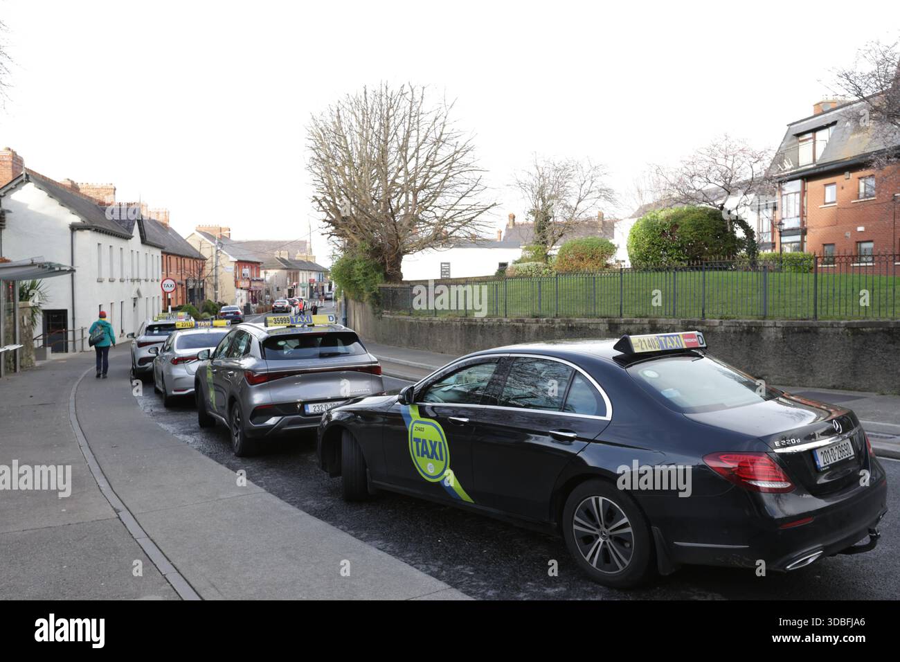 Dublin, Ireland - 14th December 2025 - A taxi rank with waiting taxis ...