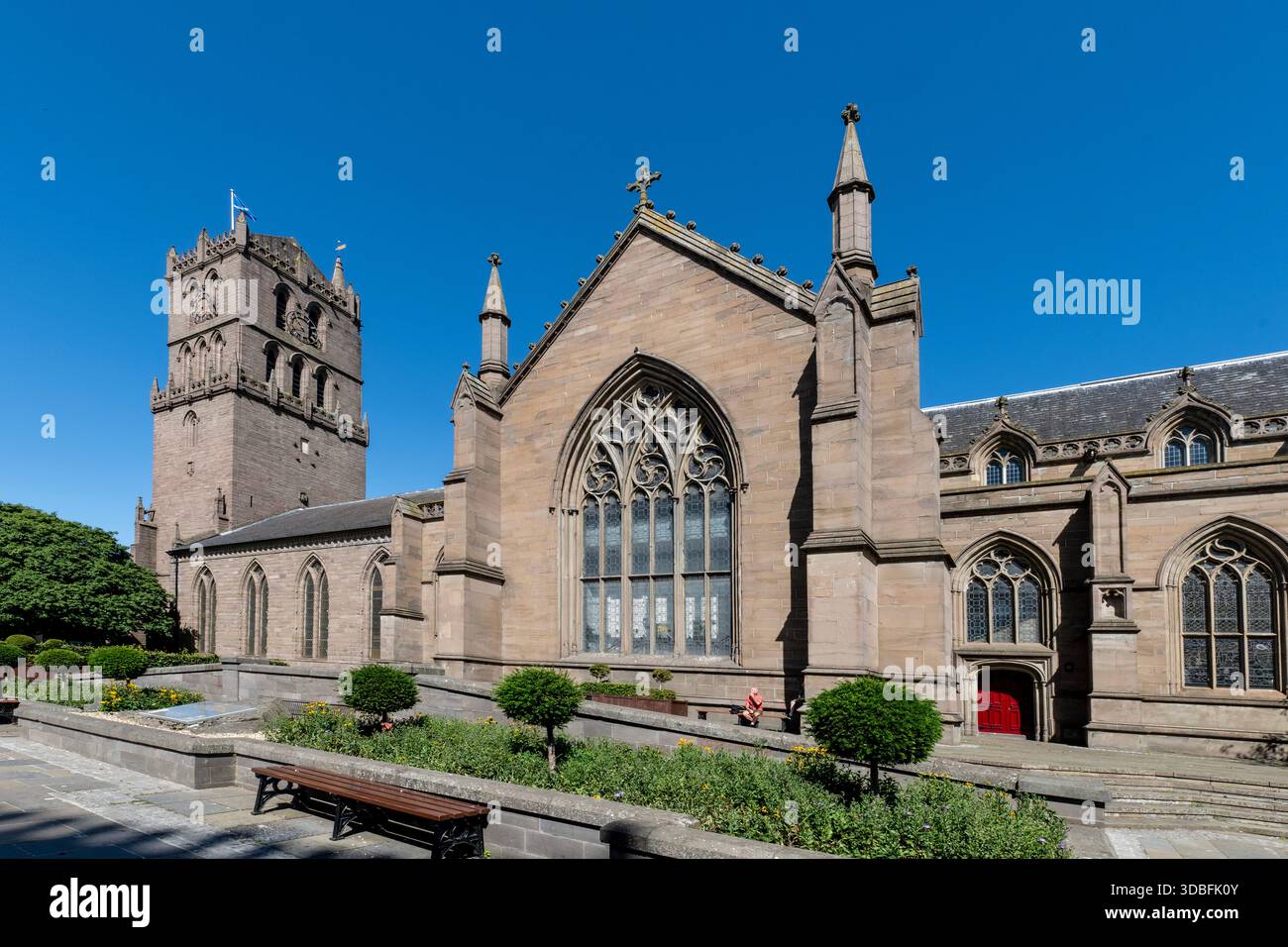 A historic stone church in Dundee, Nethergate, featuring a tall tower ...