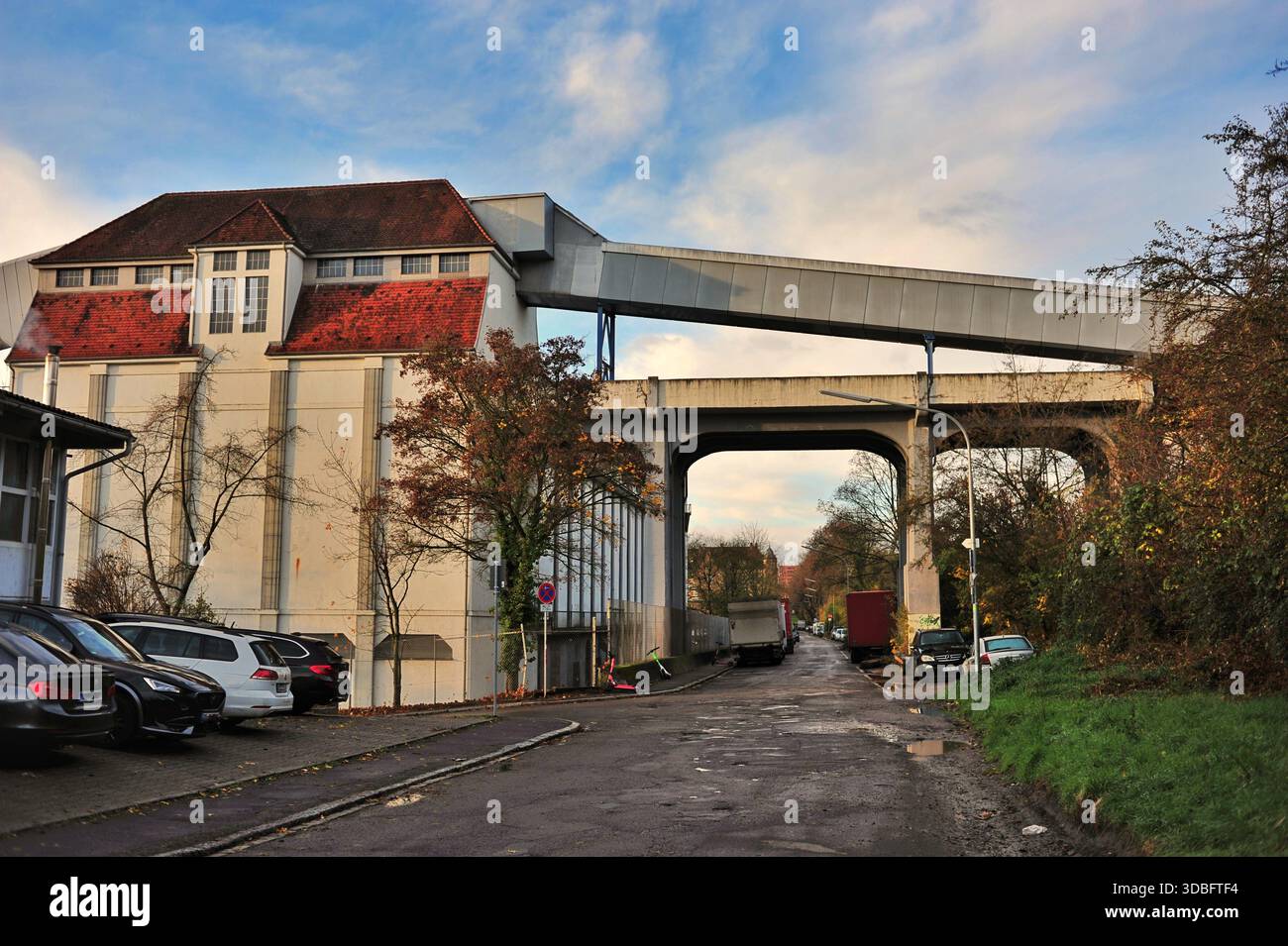 Industrial Overpass Spanning Parked Cars And Asphalt Lane, Elevated ...