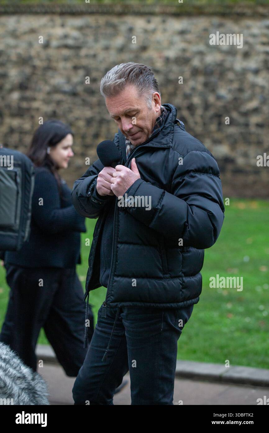 London, UK. 16th Dec 2025. Chris Peckham pushed a giant model badger ...