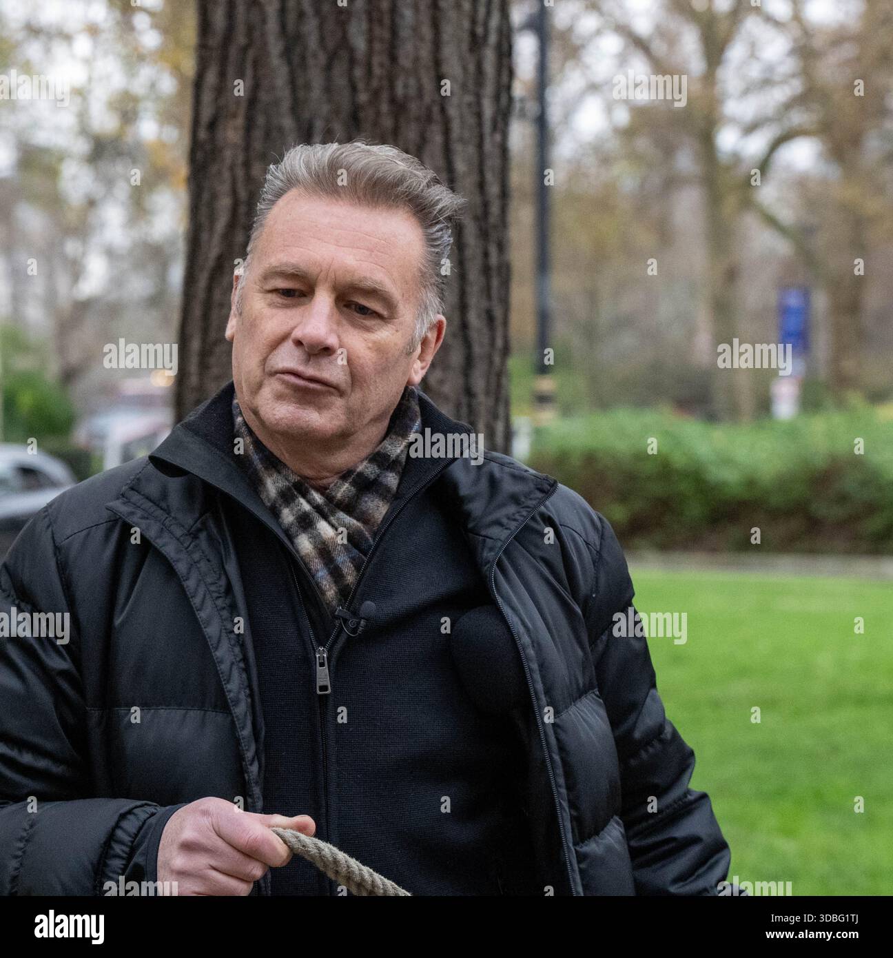 London UK 16 Dec 2025 Chris Packham with a large model badger in ...