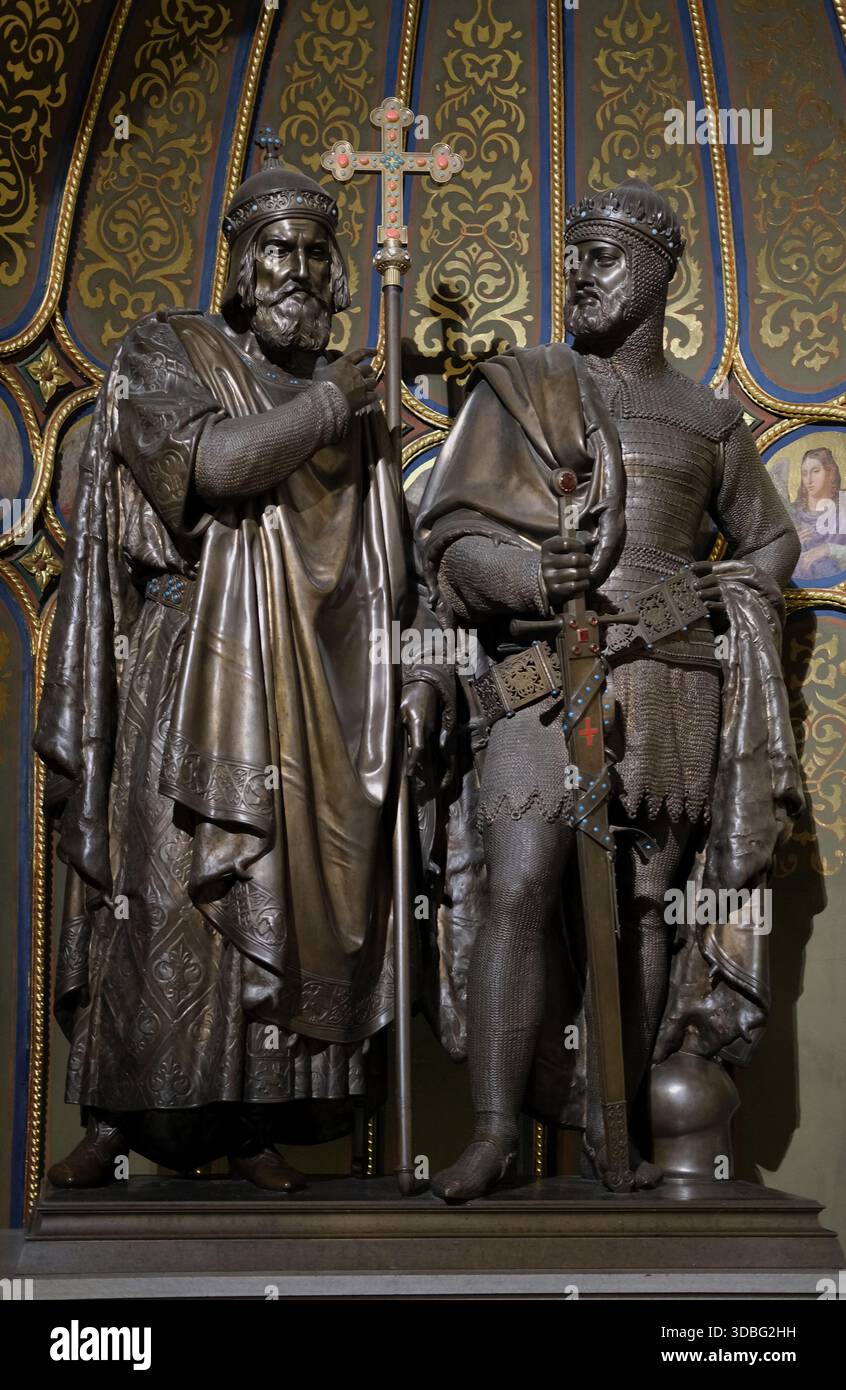 Two life-size bronze sculptures of crowned medieval rulers, patinated ...