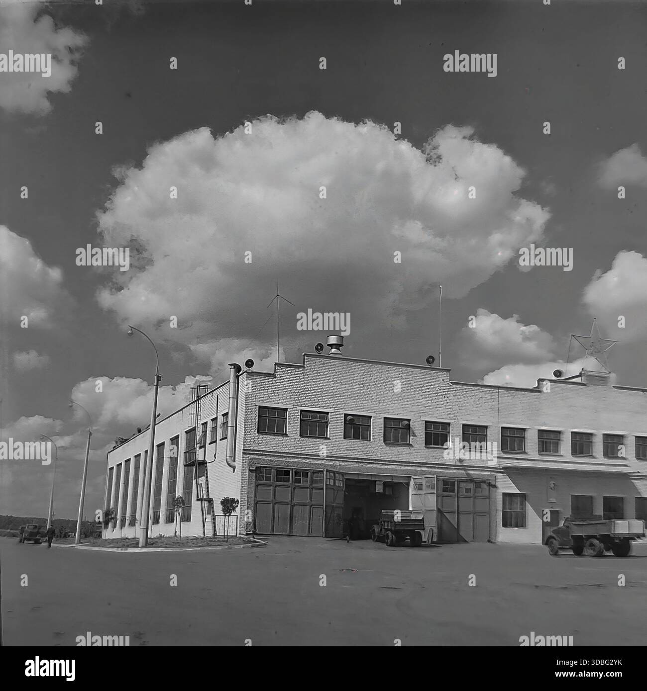 Black and white archival photo capturing the exterior of a large Soviet ...