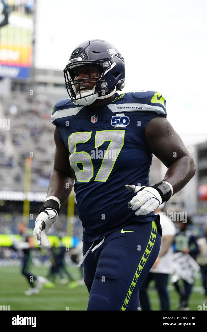 Seattle Seahawks offensive tackle Charles Cross (67) looks on before an ...