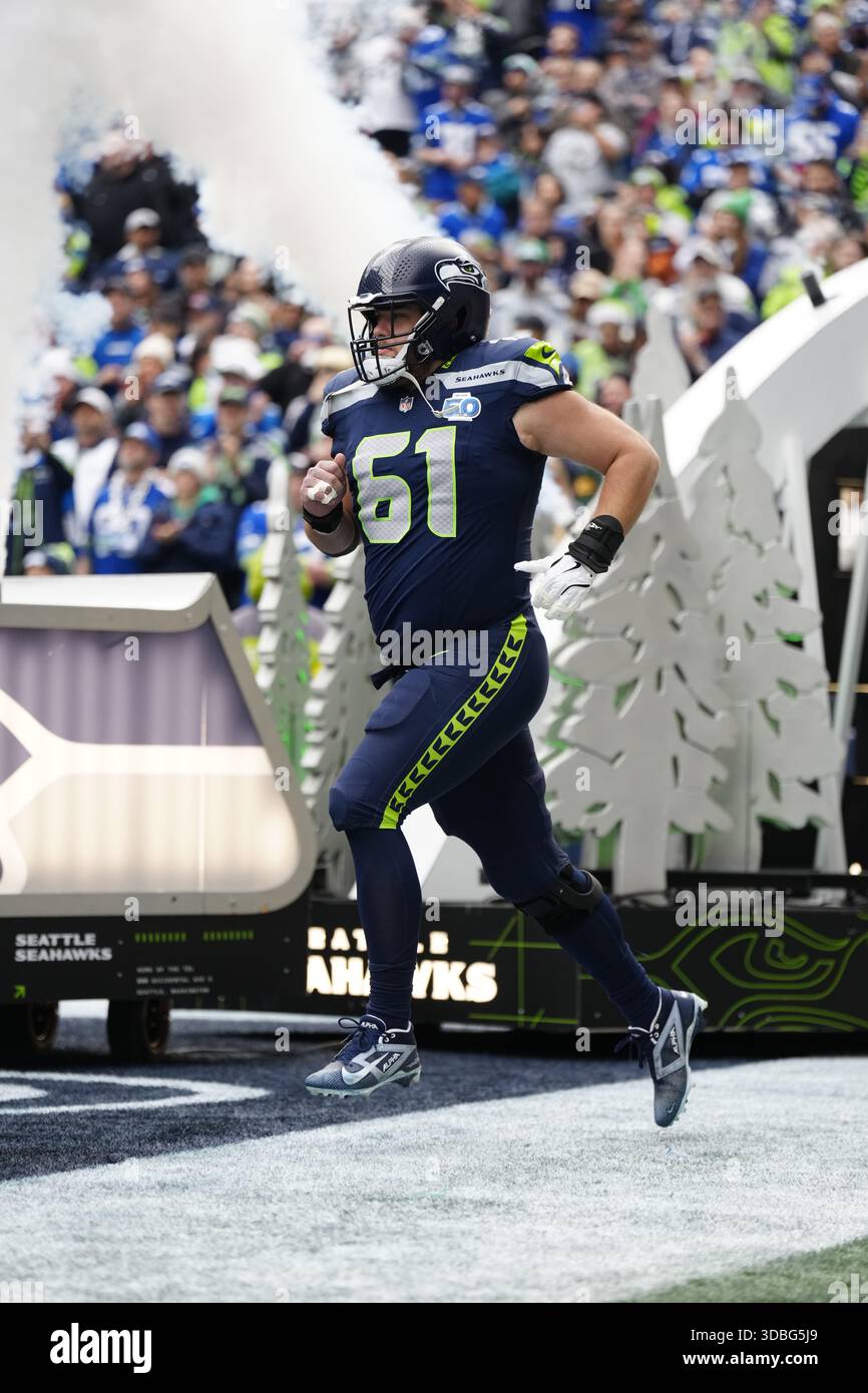 Seattle Seahawks center Jalen Sundell (61) runs out onto the field ...