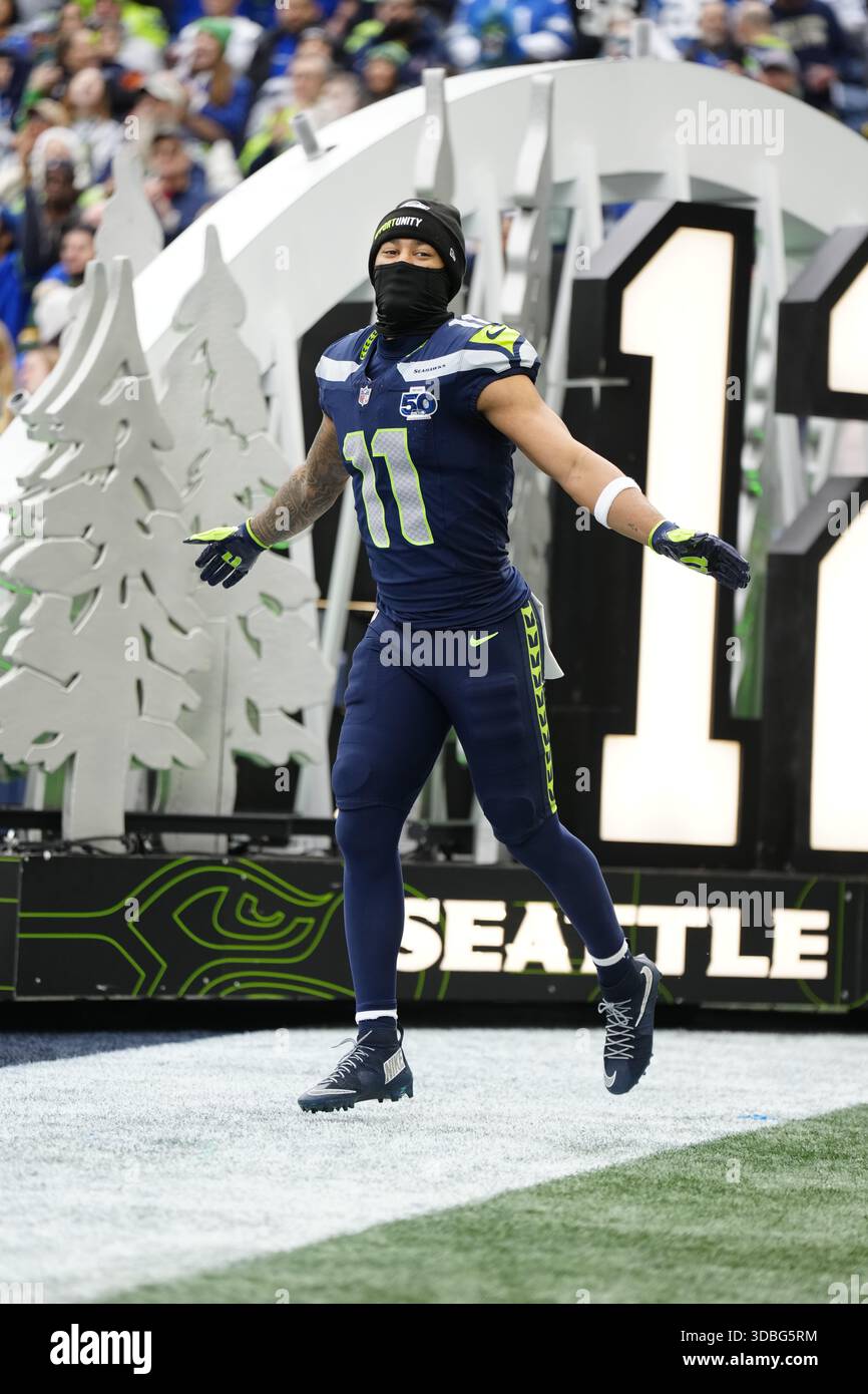 Seattle Seahawks wide receiver Jaxon Smith-Njigba (11) runs out onto ...