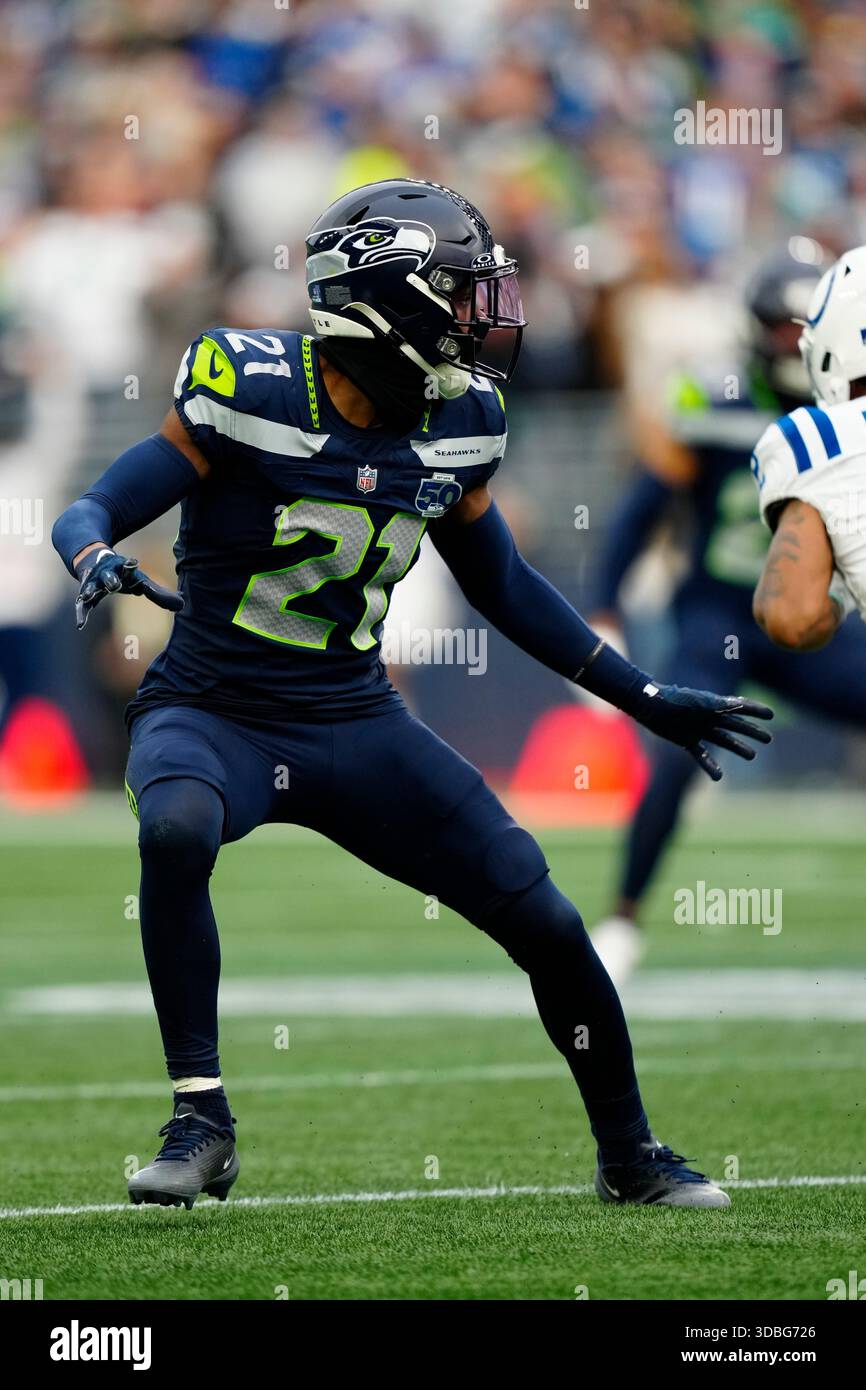 Seattle Seahawks cornerback Devon Witherspoon (21) looks back during an ...