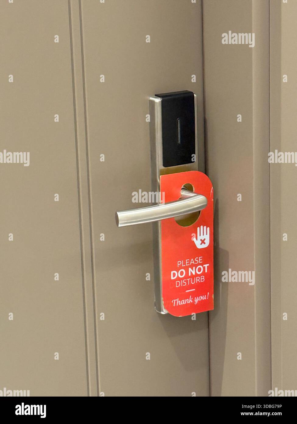 Do not disturb sign on hotel door handle conveys privacy and discretion ...