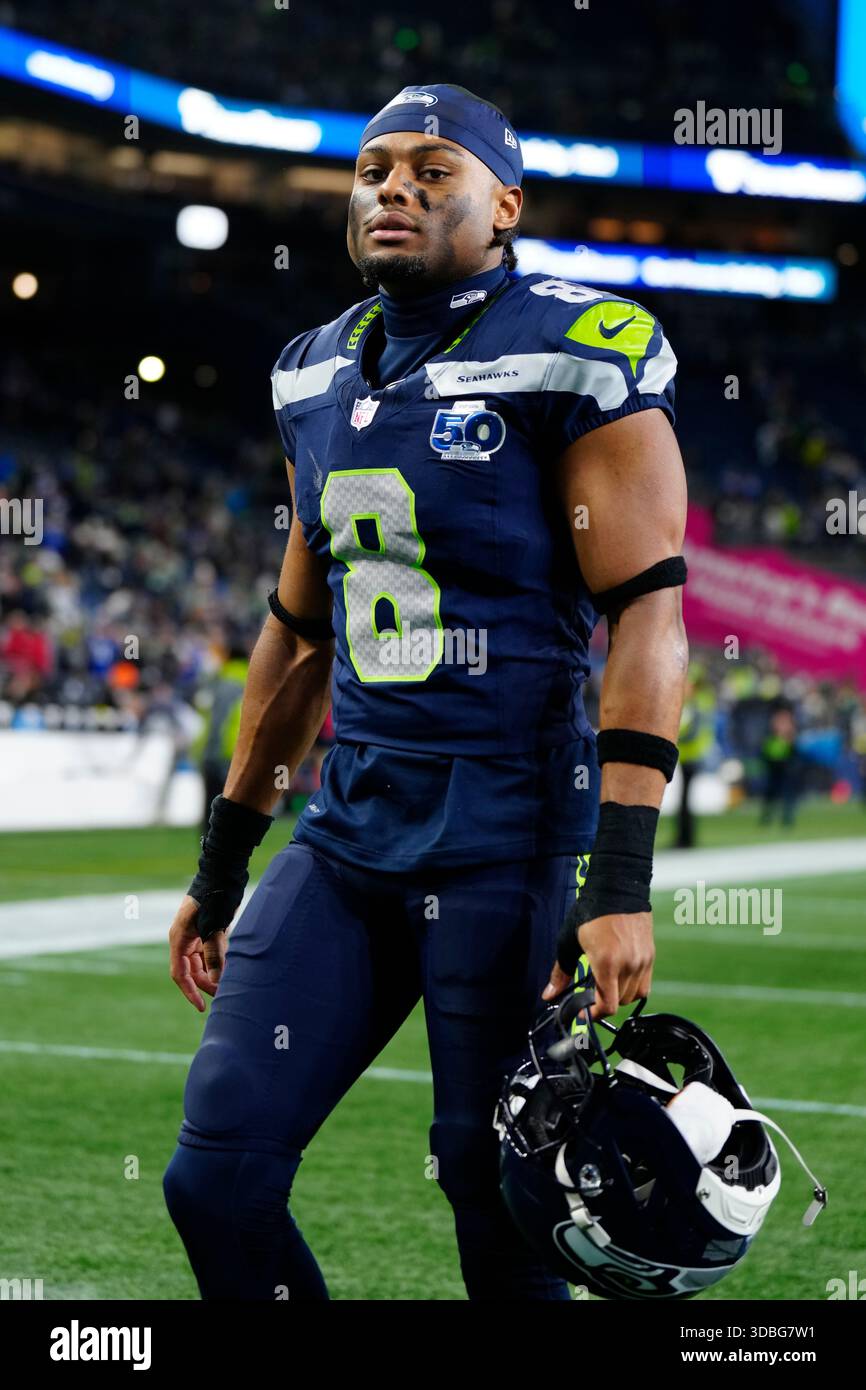 Seattle Seahawks safety Coby Bryant (8) walks off the field after an ...