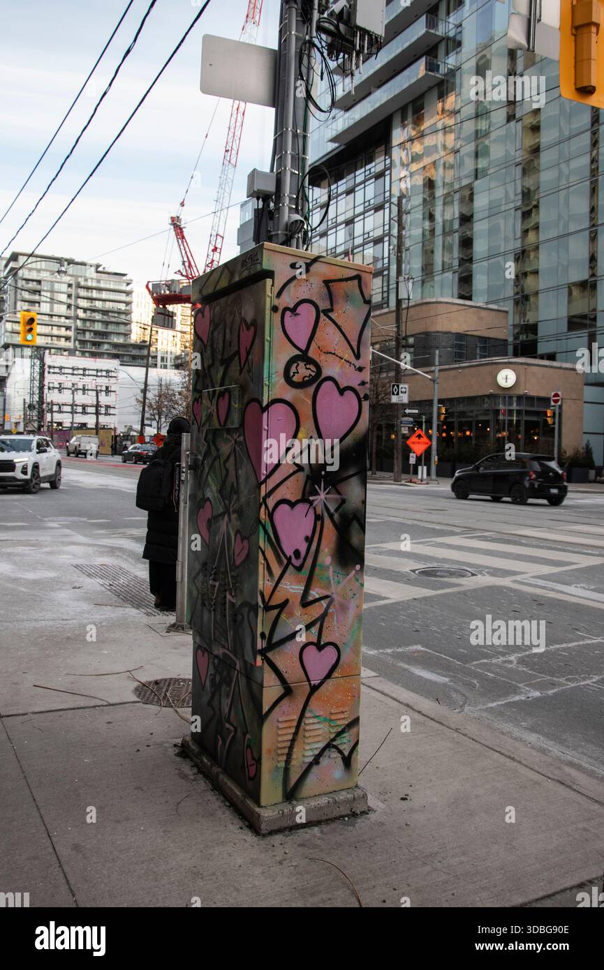 Arrows and hearts mural on an electrical traffic control box on ...