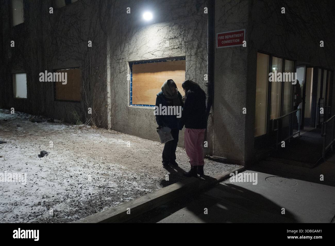 Sabrina Sutherland, left, stands outside the Toronto warming centre ...