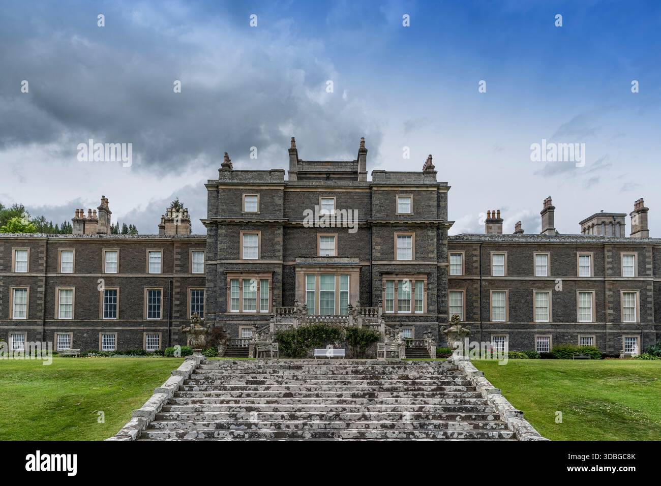 Stately mansion exterior with wide stone steps, formal lawn, and ...