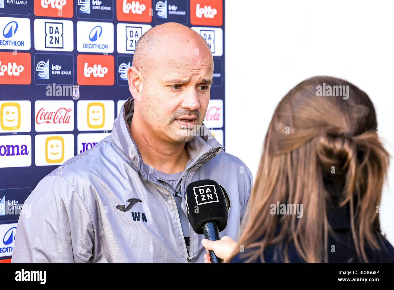 DAZN journalist Josefien Hendrickx is interviewing head coach Wouter ...