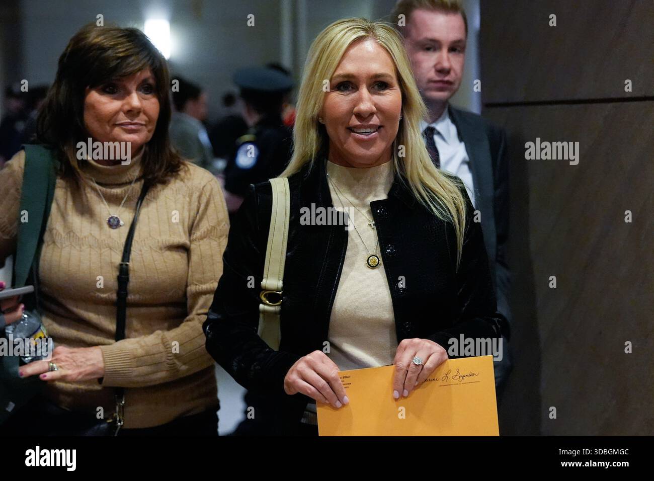 Rep. Marjorie Taylor Greene, R-Ga., departs a briefing on military ...