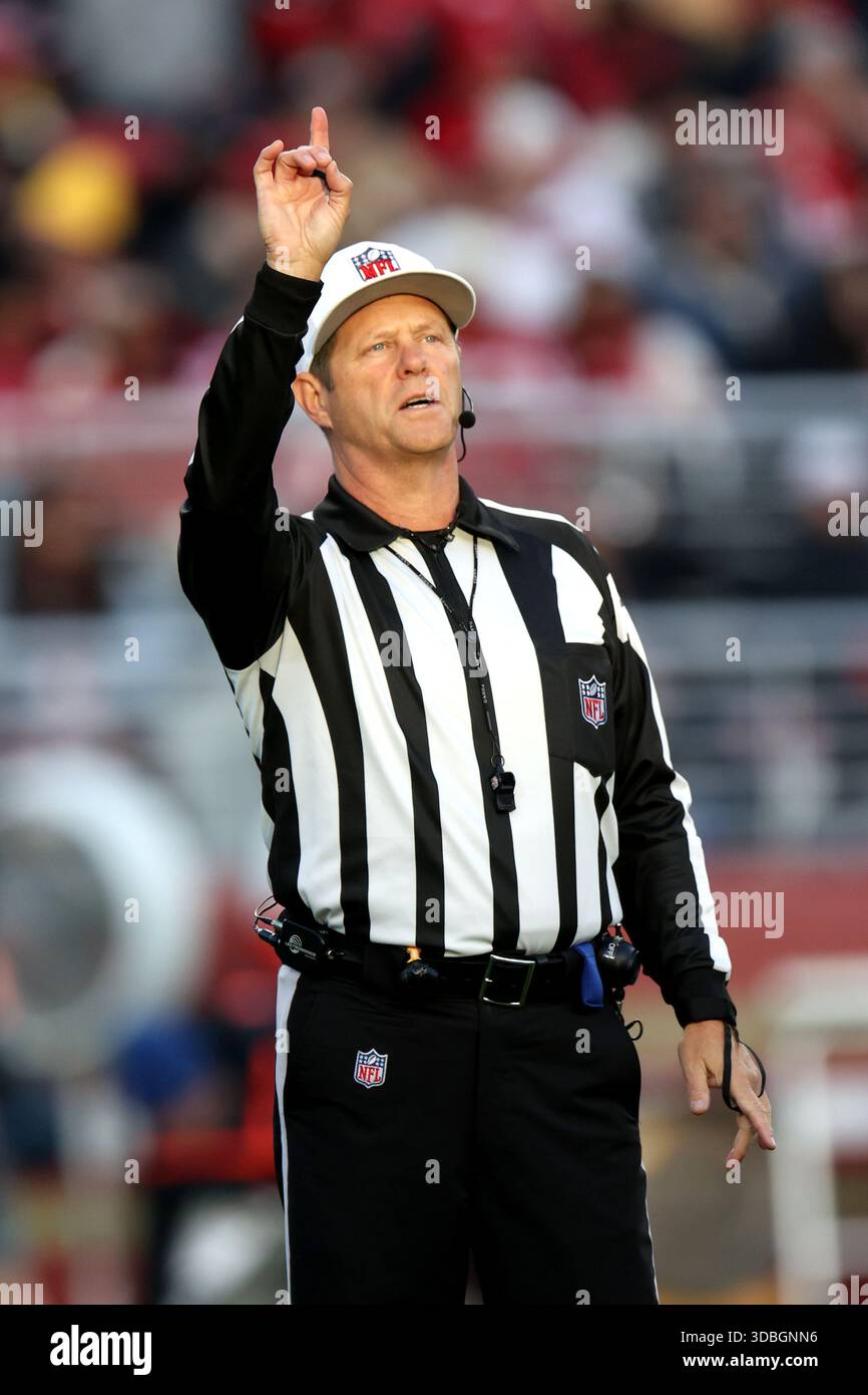 Referee Craig Wrolstad (4) signals during an NFL football game between ...