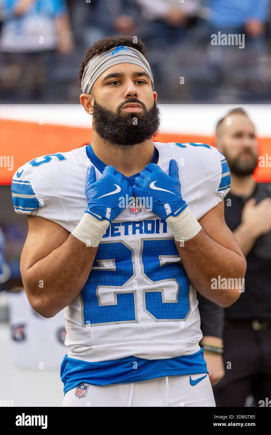 Detroit Lions running back Jacob Saylors (25) stands for the national ...