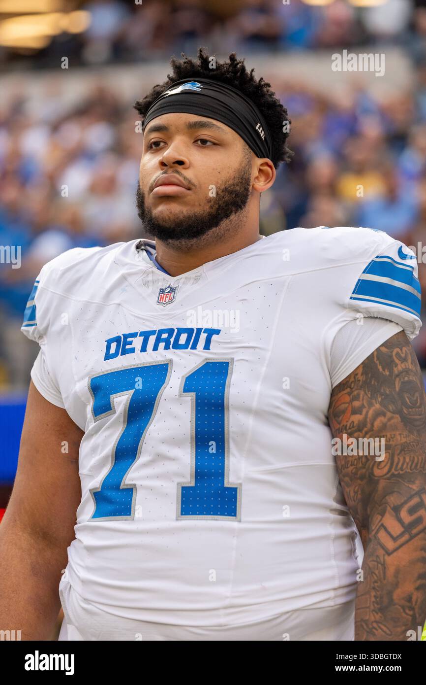 Detroit Lions offensive lineman Miles Frazier (71) stands for the ...