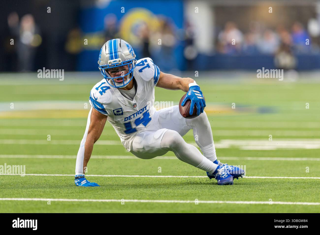Detroit Lions wide receiver Amon-Ra St. Brown (14) gets up after making ...