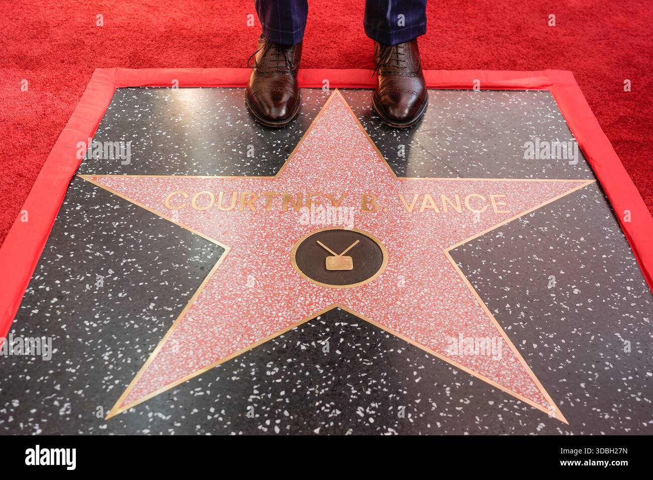 Courtney B. Vance poses with his new star on the Hollywood Walk of Fame ...