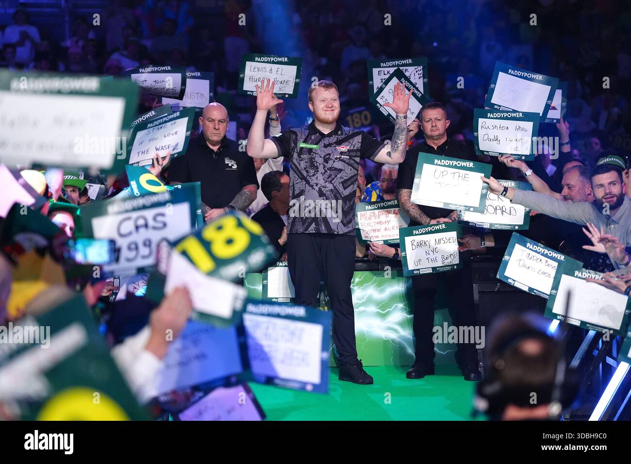 Adam Gawlas acknowledges the fans as he makes his way to the stage on ...