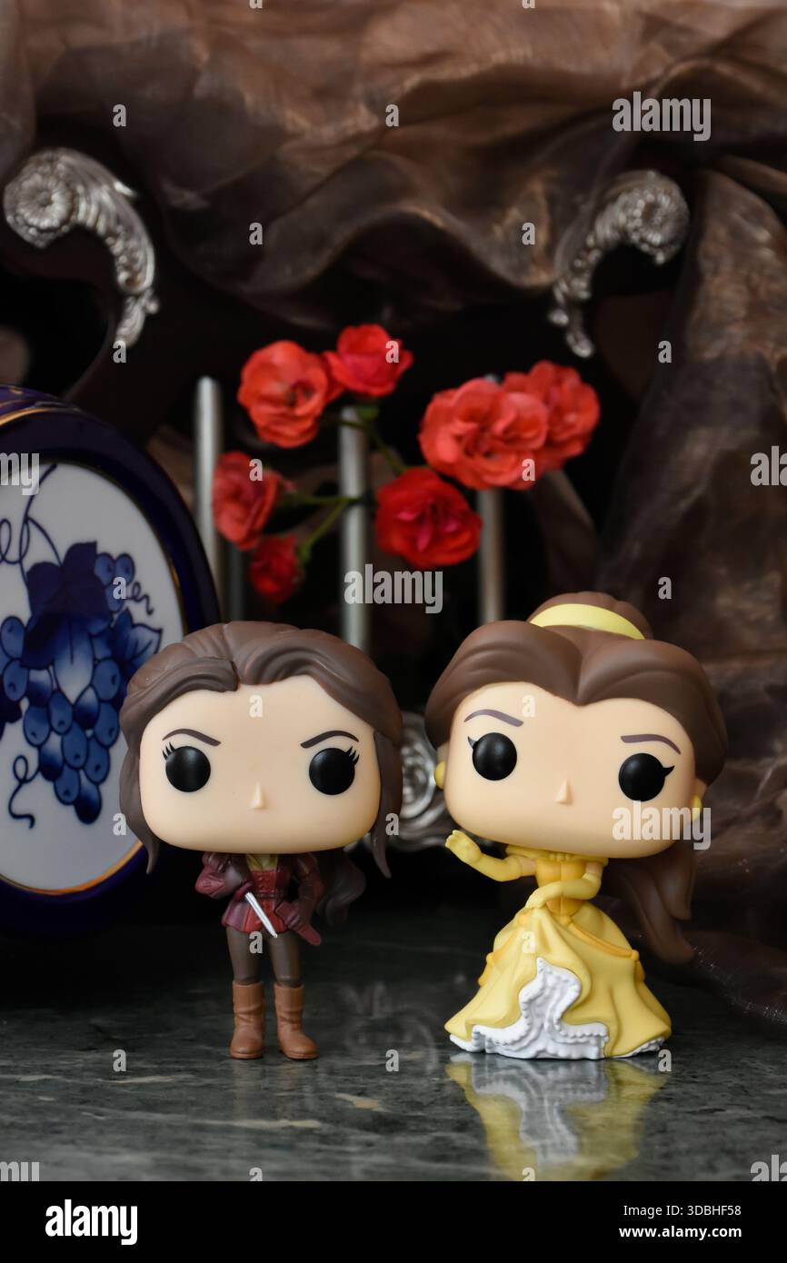 Funko Pop action figures of princess Belle from Disney animated film ...