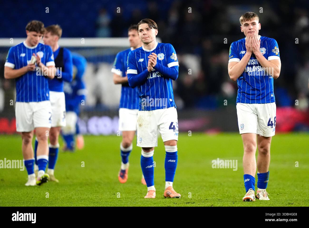 Cardiff City's Dylan Lawlor (right), Cian Ashford (centre) and team ...