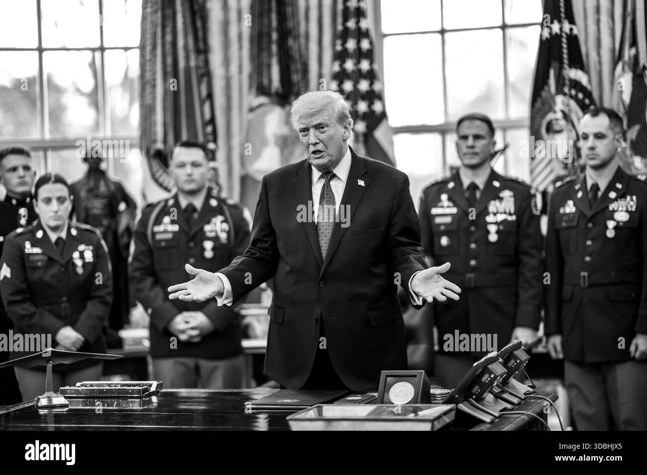 President Donald Trump answers questions from members of the media ...