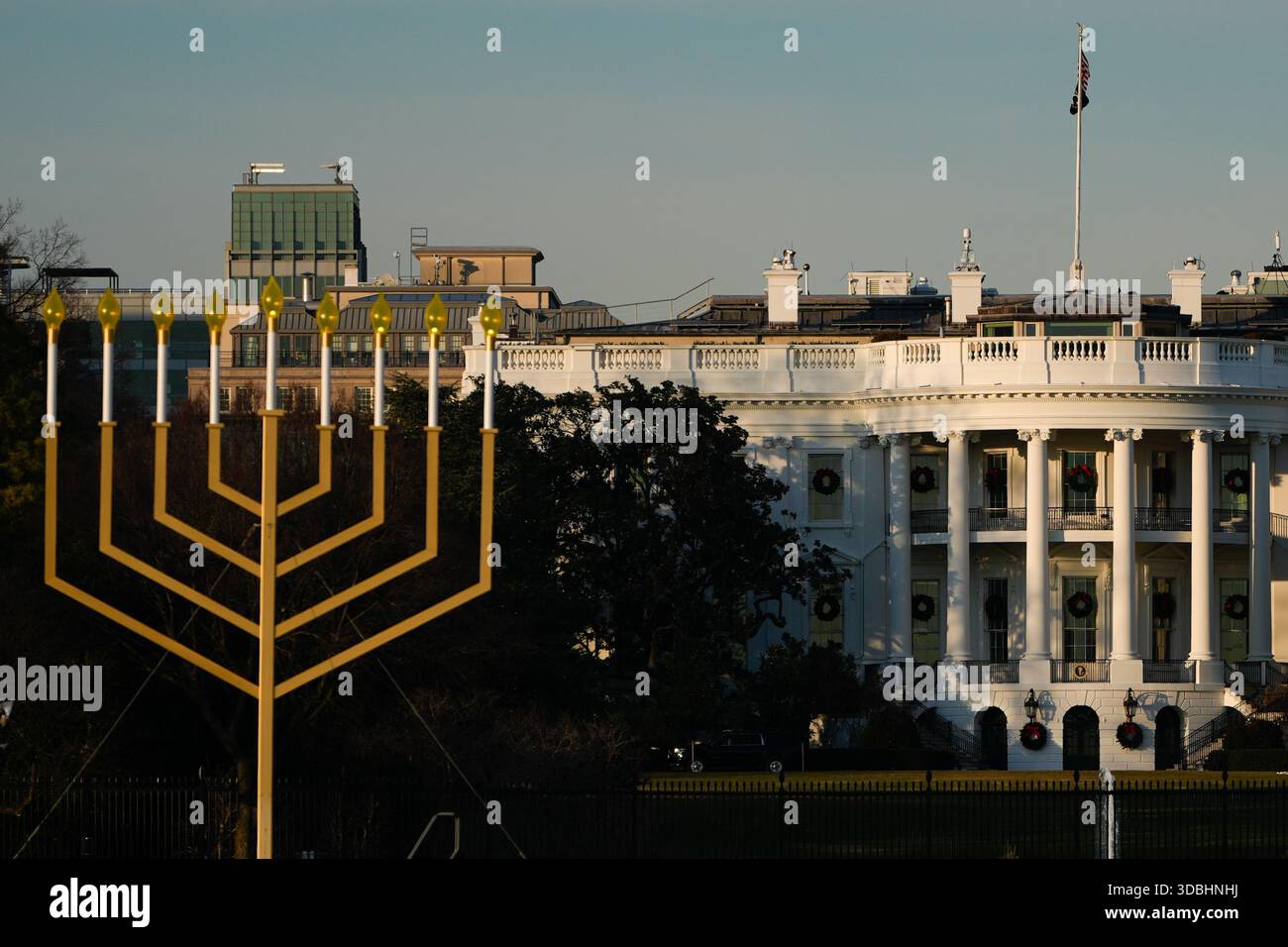 A large menorah stands in front of the White House on the third night ...
