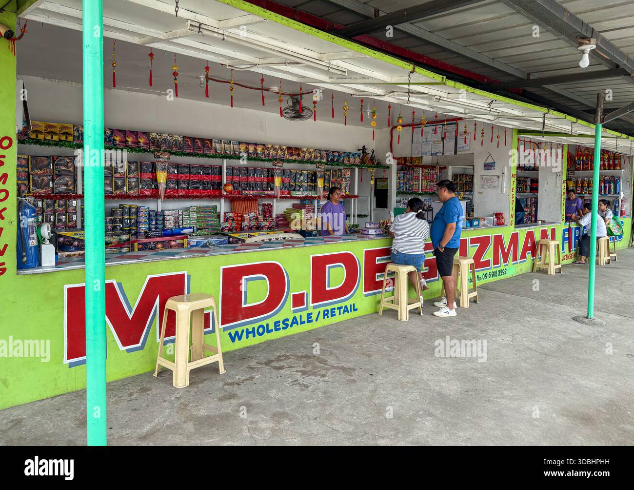 Bocaue, Bulacan, Philippines. December 16,2025. Customers make ...