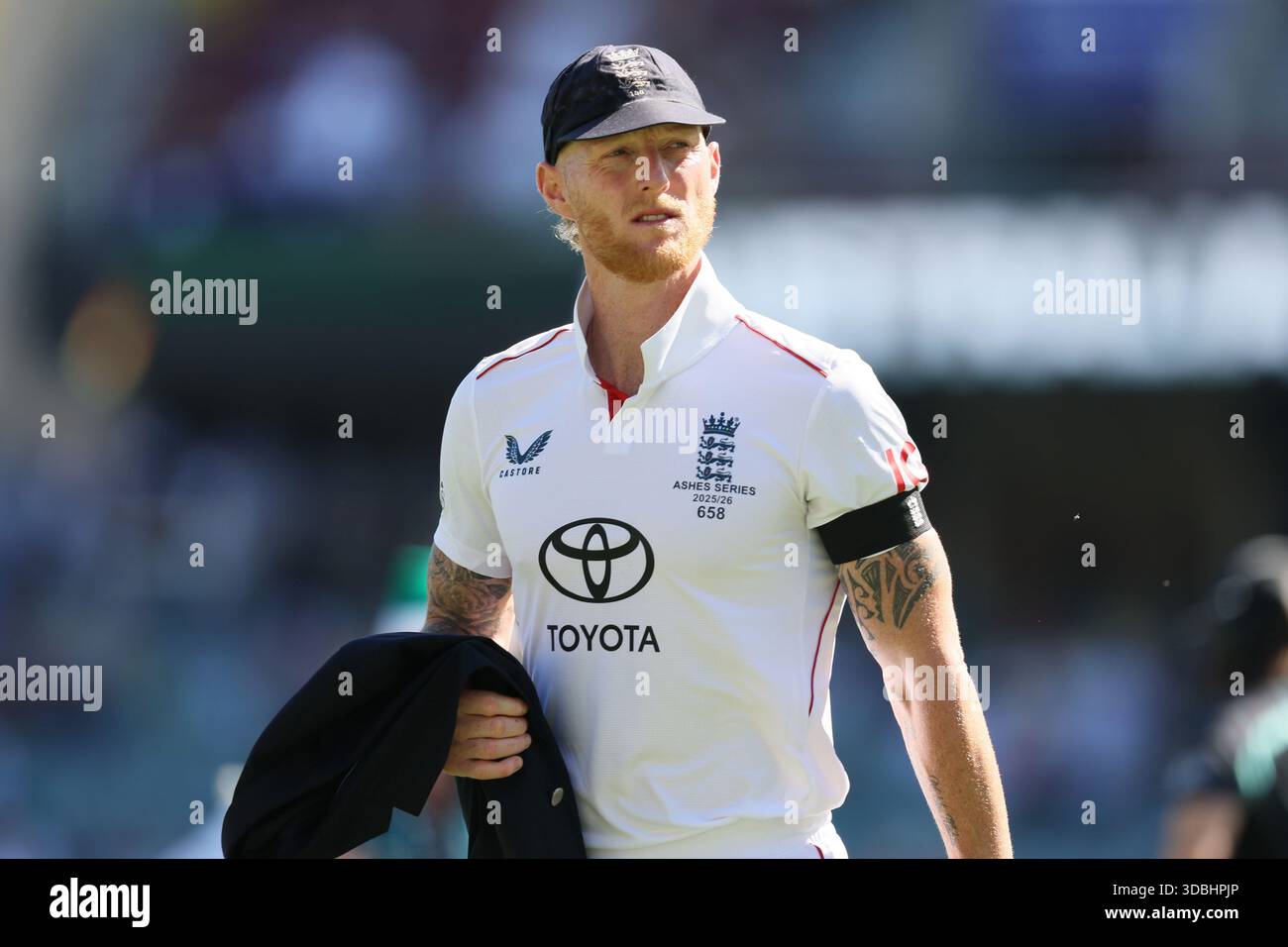 England's Ben Stokes walks after coin toss during play on day one of ...