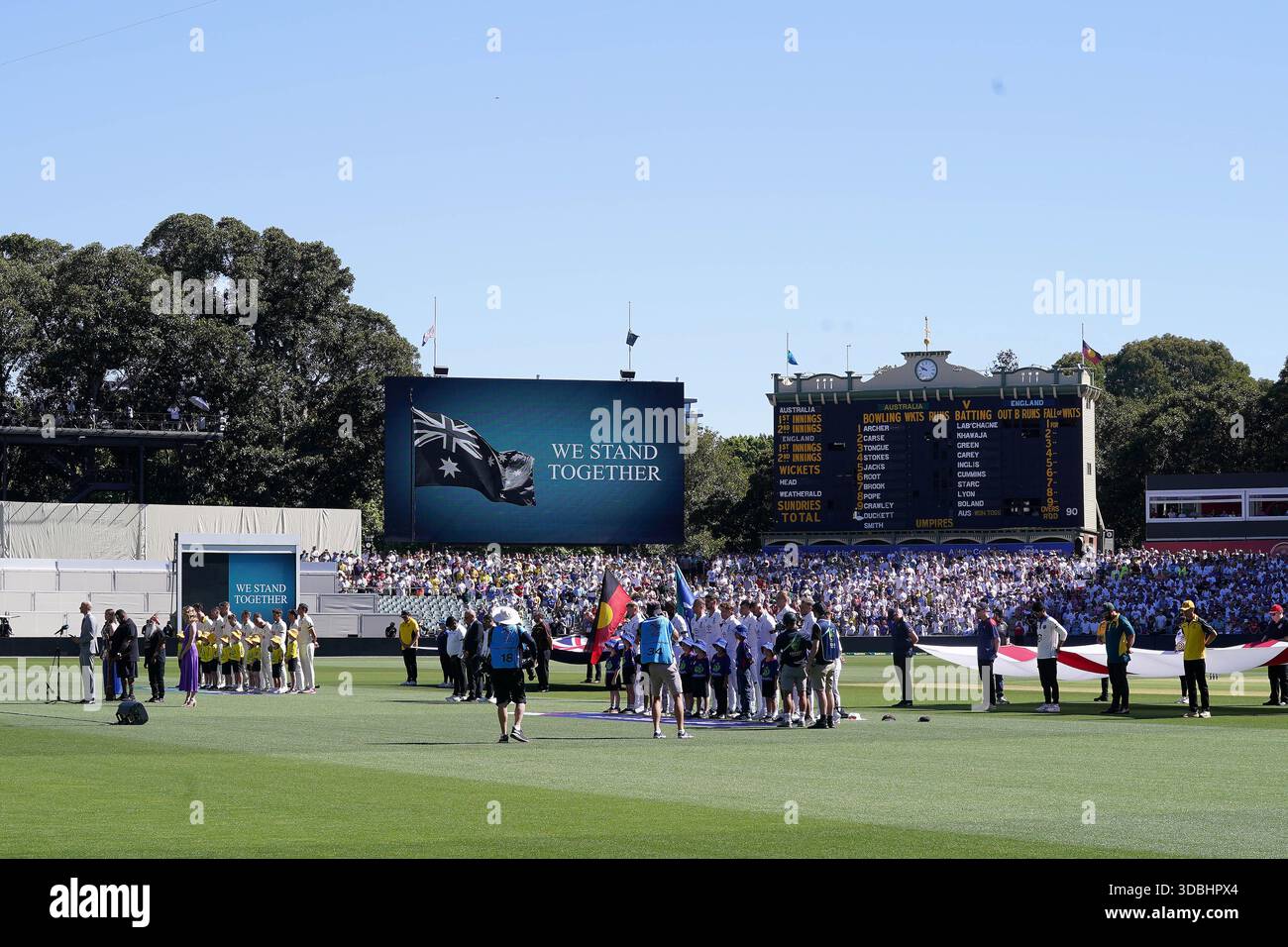 Australia and England players observe a minute's silence in tribute to the victims of the Bondi ...