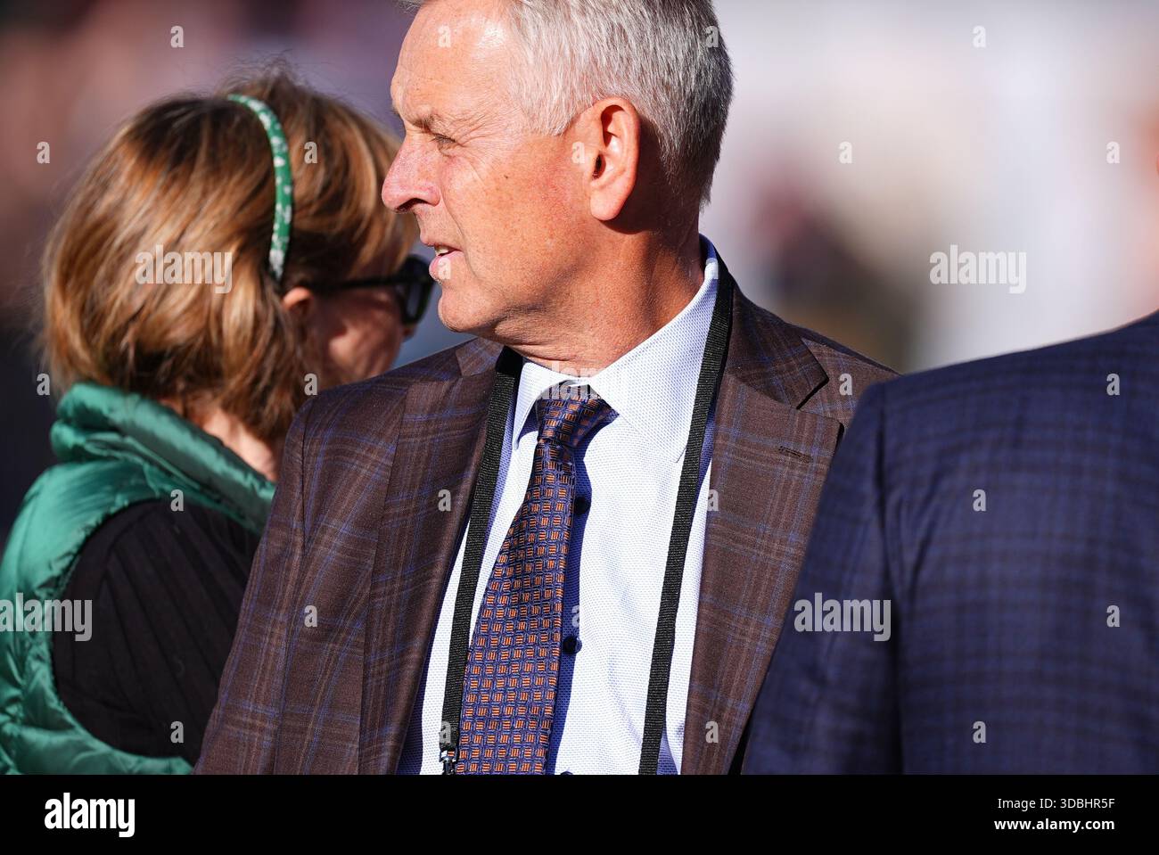 Karl Schmidt, a member of the Green Bay Packers board, looks on before ...