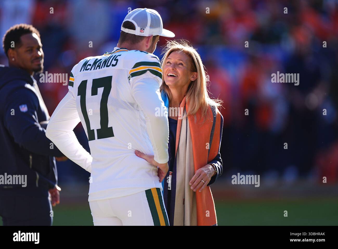 Green Bay Packers kicker Brandon McManus (17) chats with Denver Broncos ...