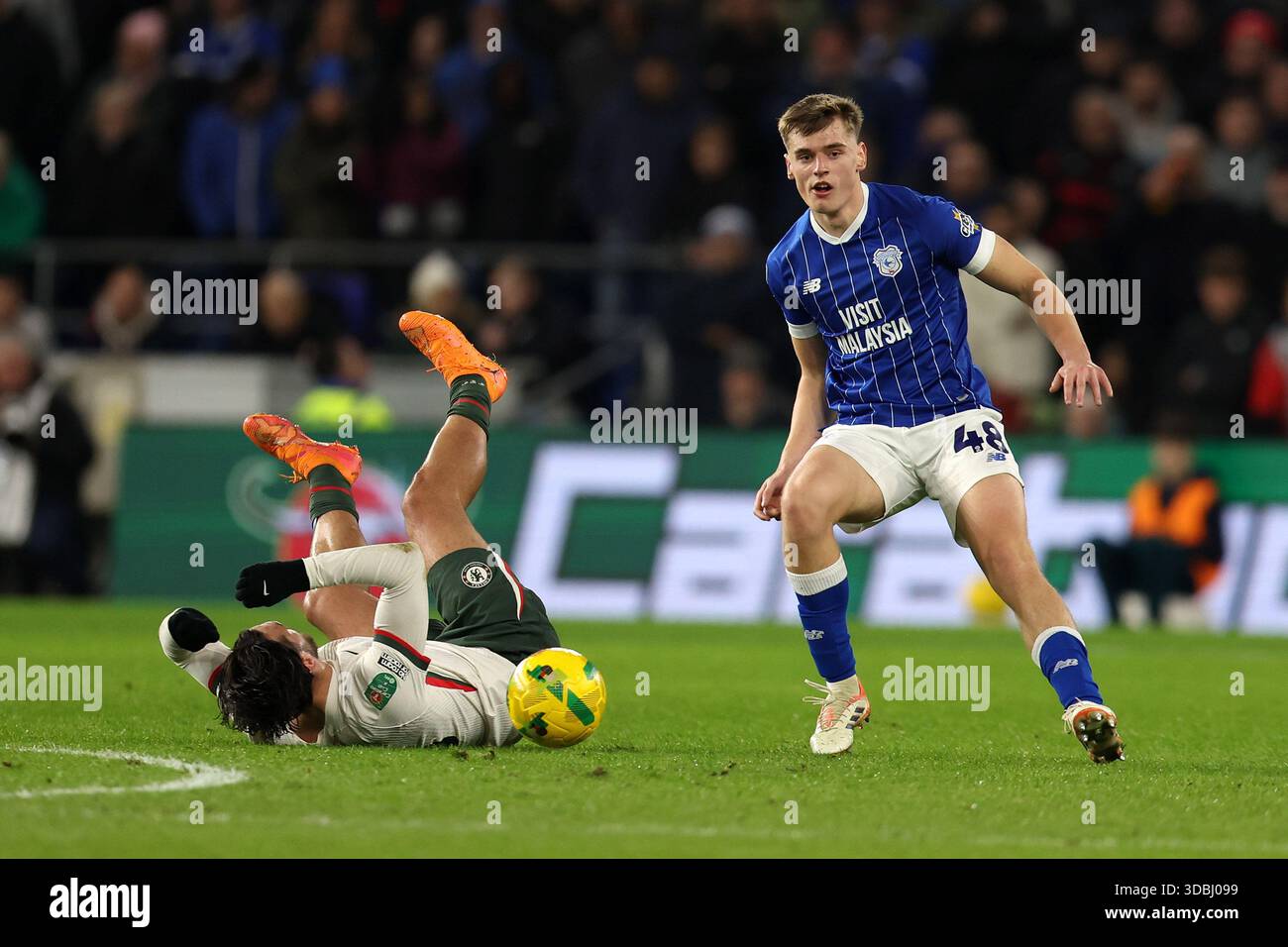 Dylan Lawlor of Cardiff City (r) & Marc Guiu of Chelsea (l) in action ...