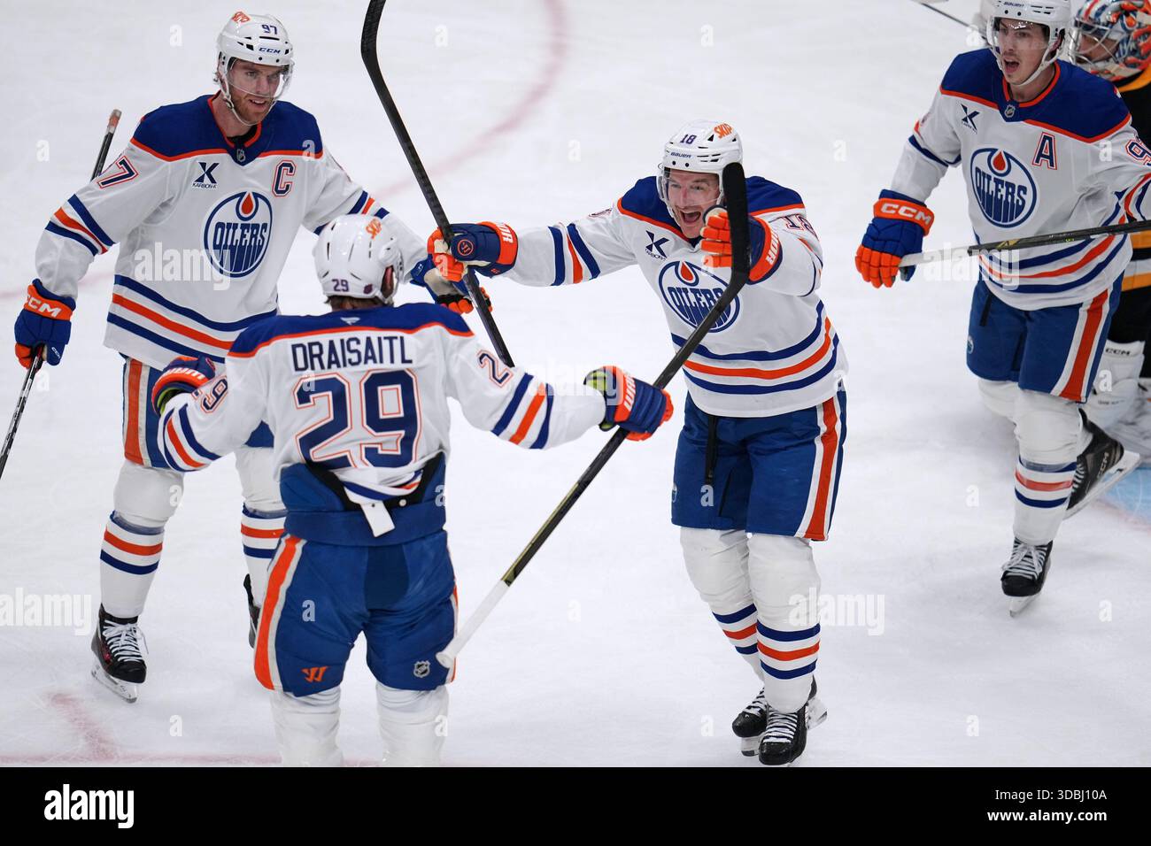 Edmonton Oilers' Leon Draisaitl (29) celebrates with Zach Hyman (18 ...
