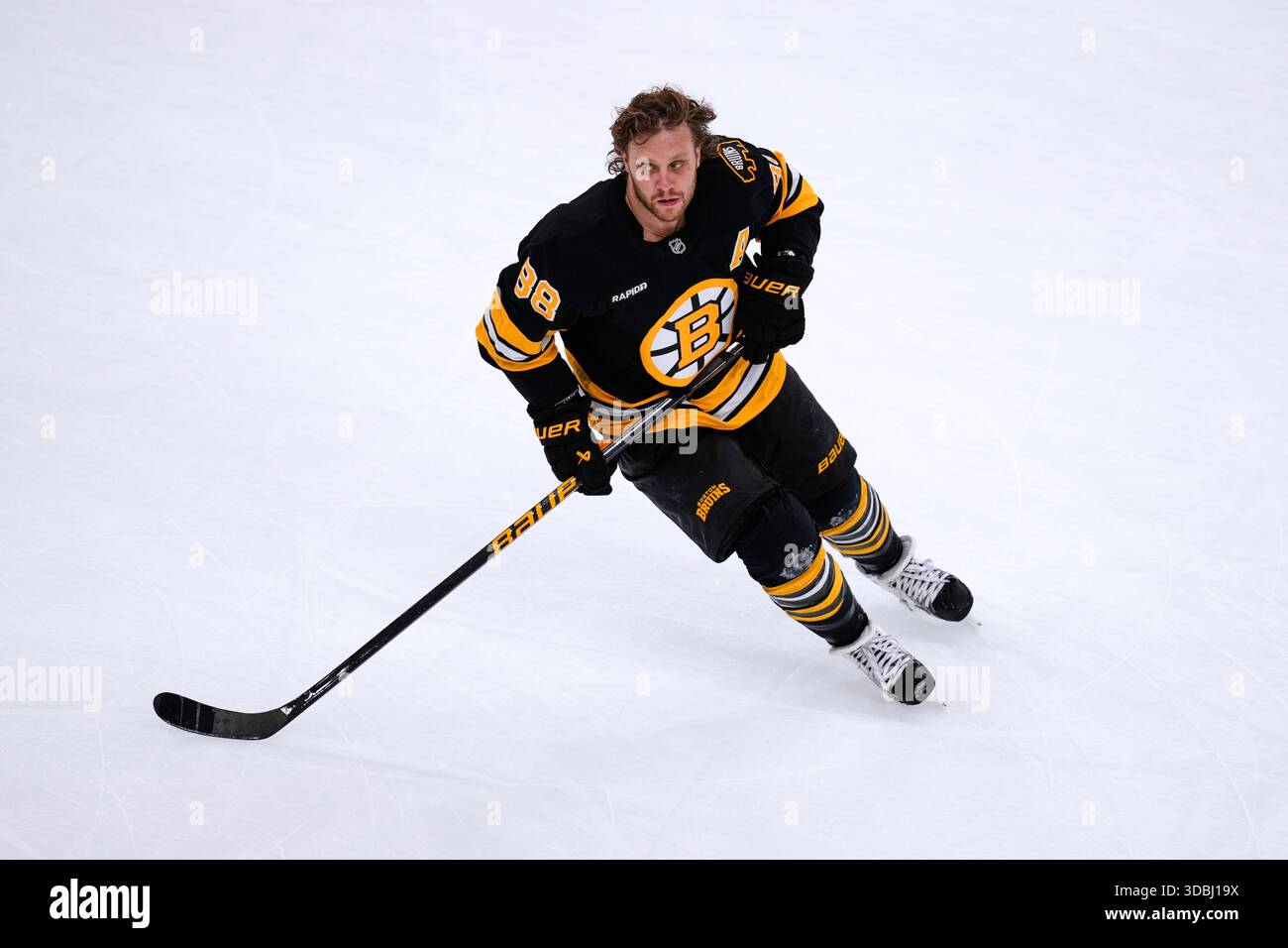 Boston Bruins right wing David Pastrnak warms up prior to an NHL hockey ...