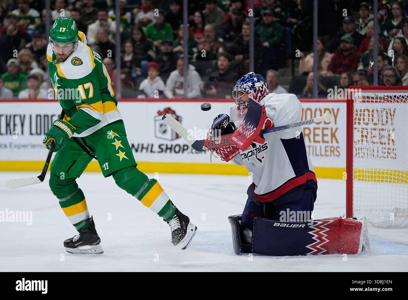 Washington Capitals goaltender Charlie Lindgren (79) stops a shot while ...