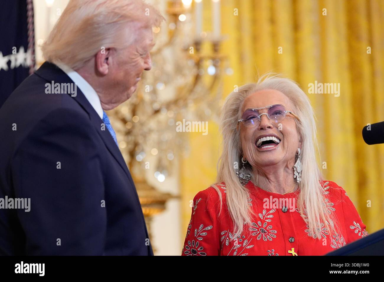 President Donald Trump listens as Miriam Adelson speaks during a ...